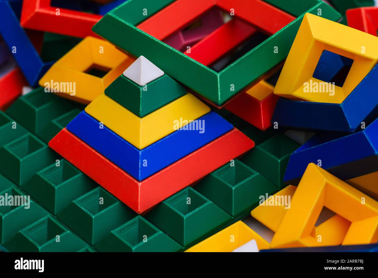 Geometric blocks constructor. The colored pyramid is assembled from ...