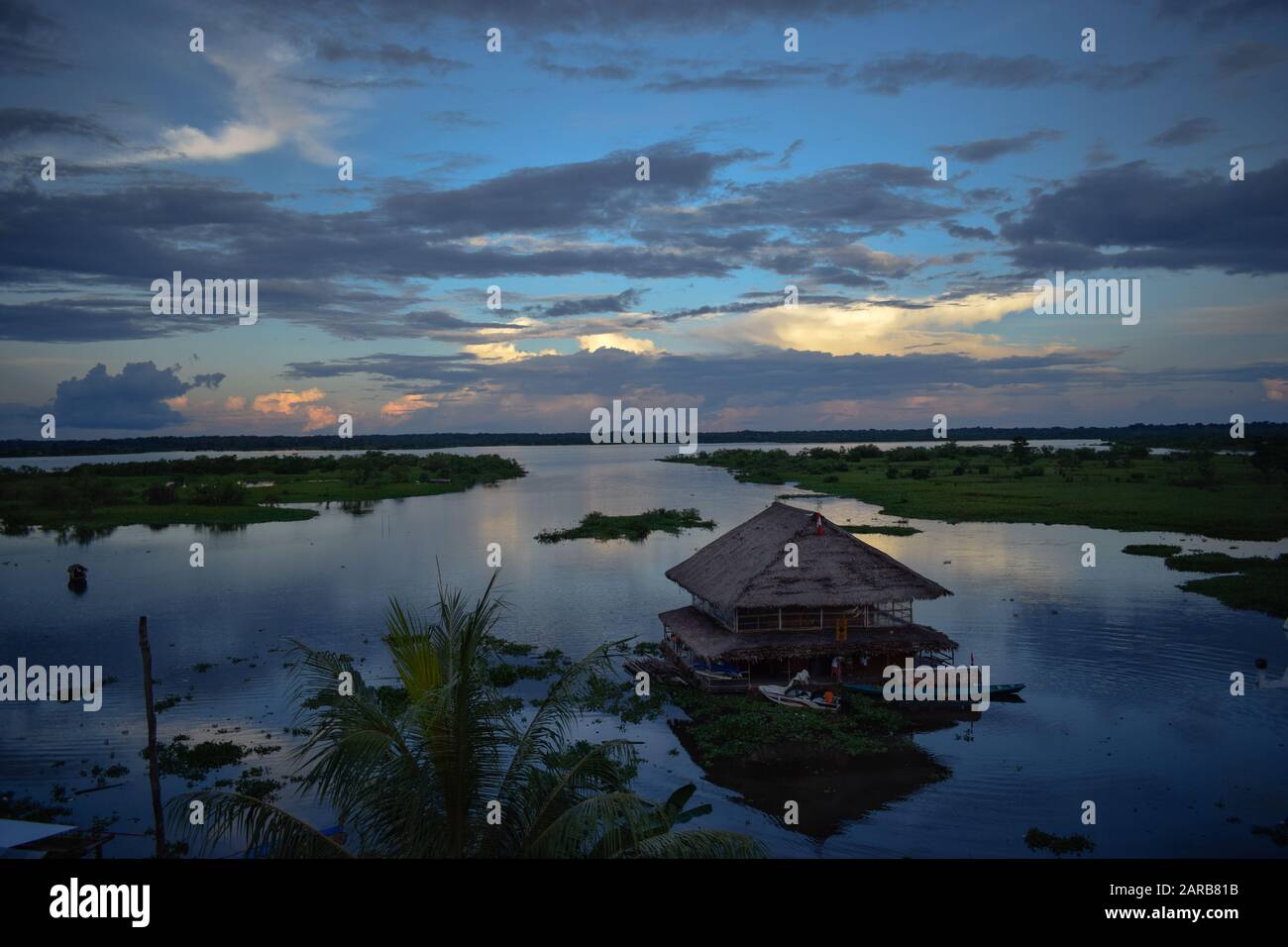 Beautiful blue sunset observed in the peruvian jungle Stock Photo - Alamy