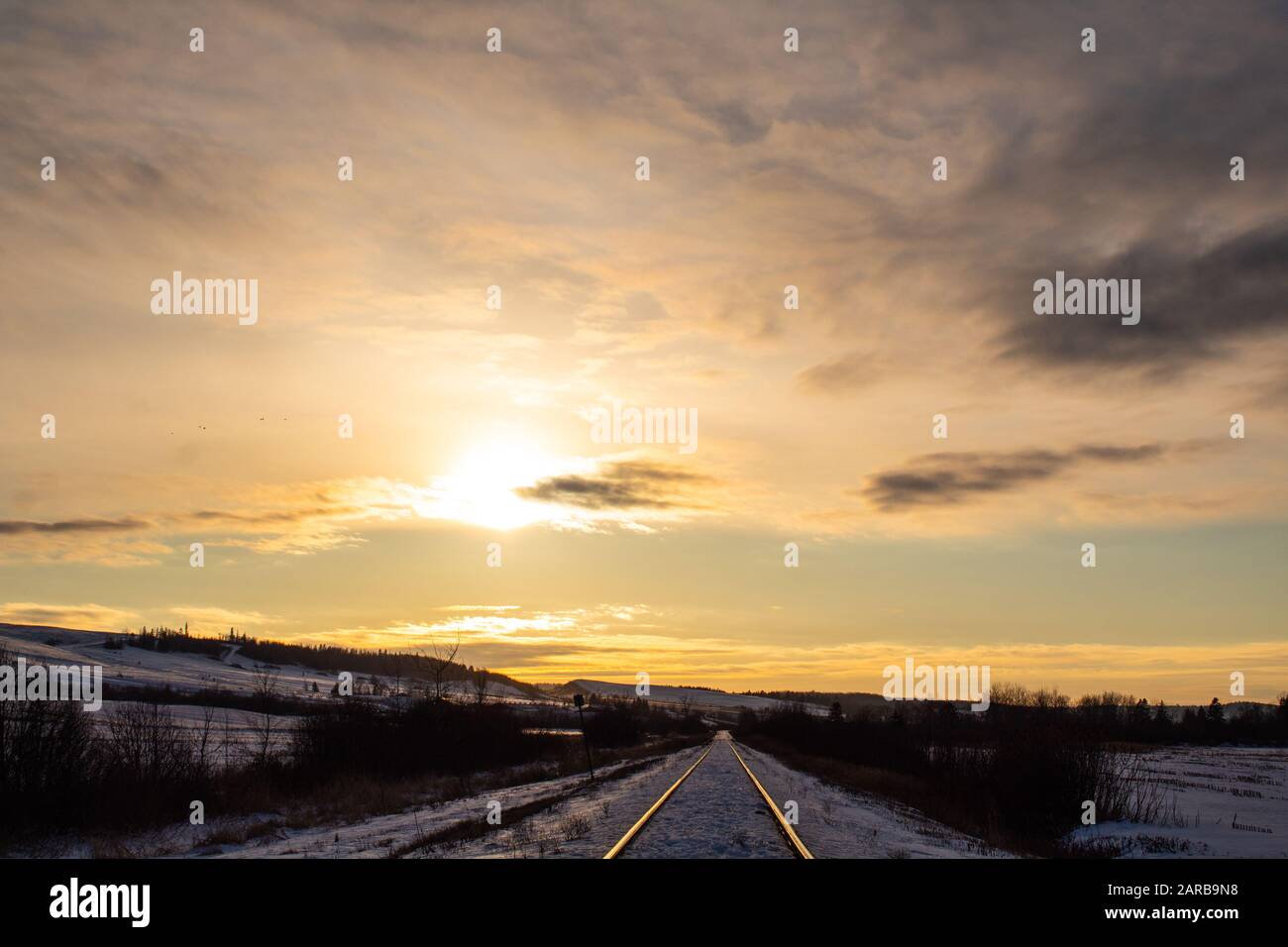 Sunset at the railroad tracks Stock Photo - Alamy