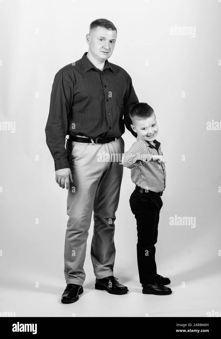 child with father. business partner. little boy with dad businessman ...