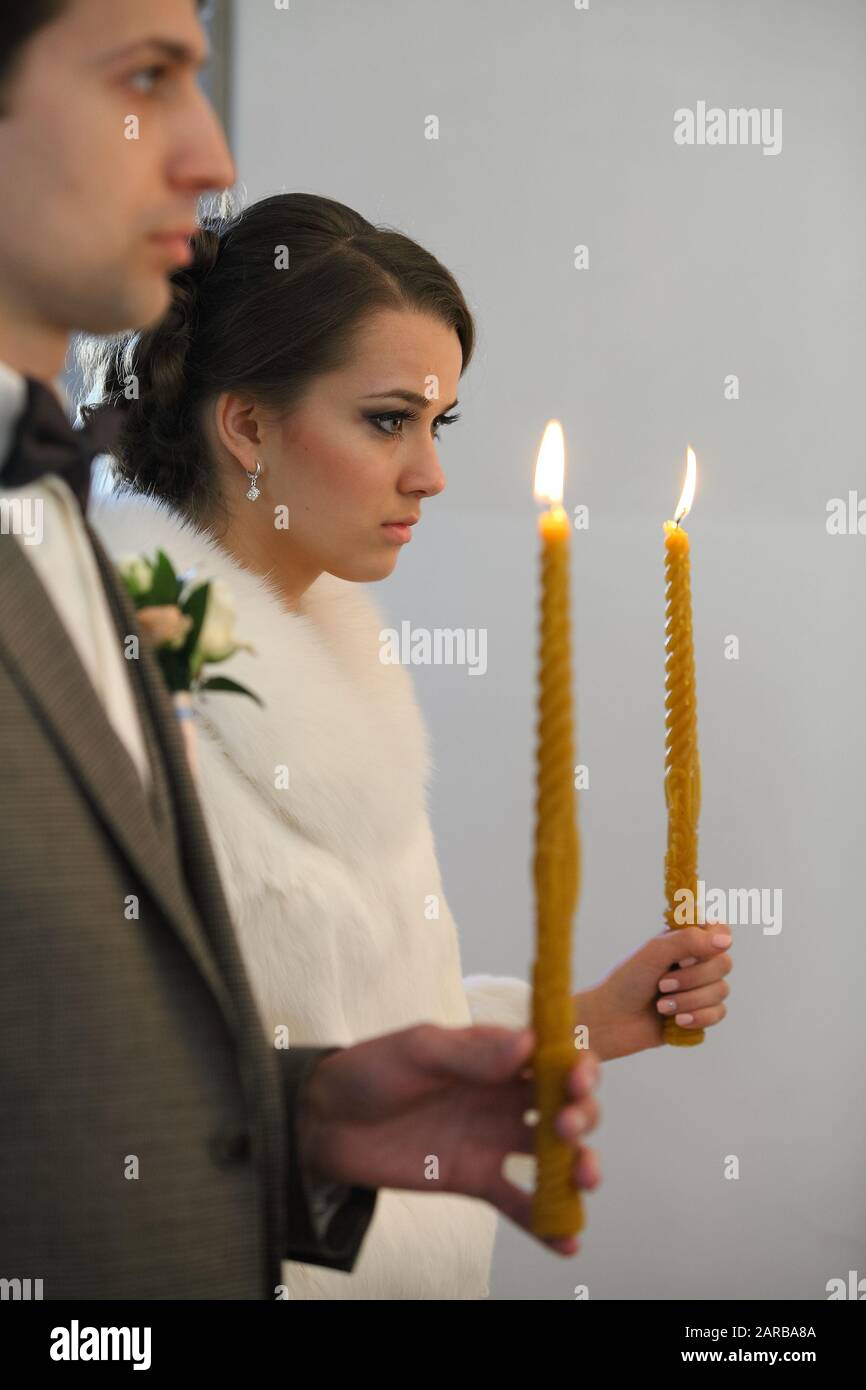 Bride and groom standing at wedding ceremony. Happy stylish wedding ...