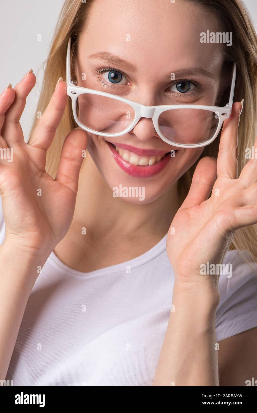 Woman rimmed glasses smile hi-res stock photography and images - Alamy
