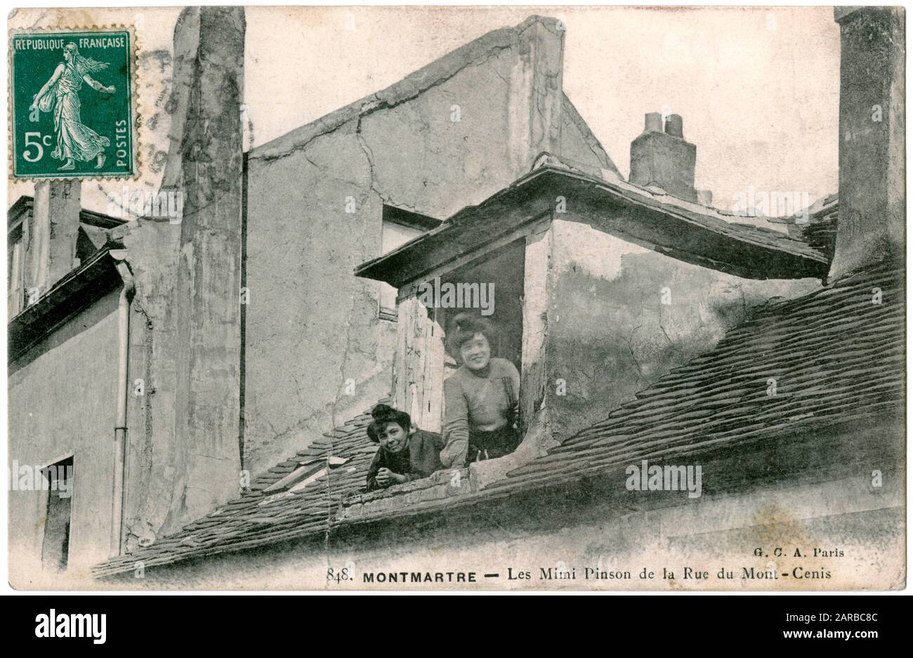 Women at attic window, Montmartre, Paris, France Stock Photo - Alamy