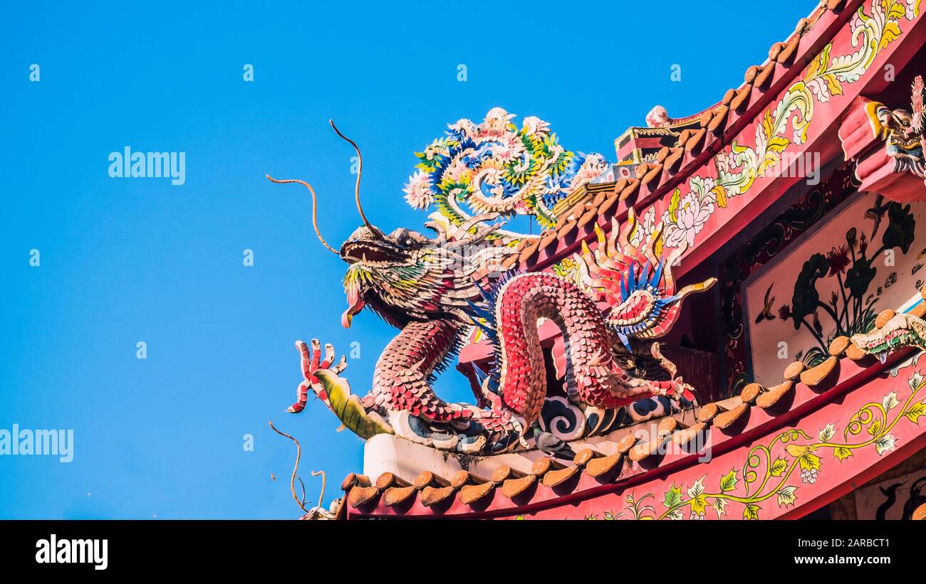Chinese dragon on the roof of chinese temple.the eaves of a temple in ...