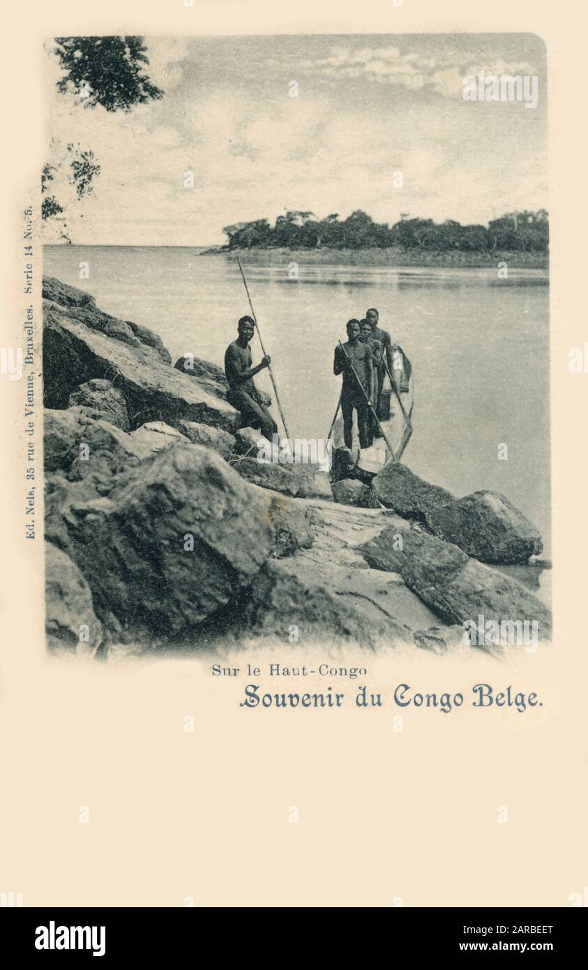 Upper Congo, Africa - Four tribesmen and their dugout canoe Stock Photo ...