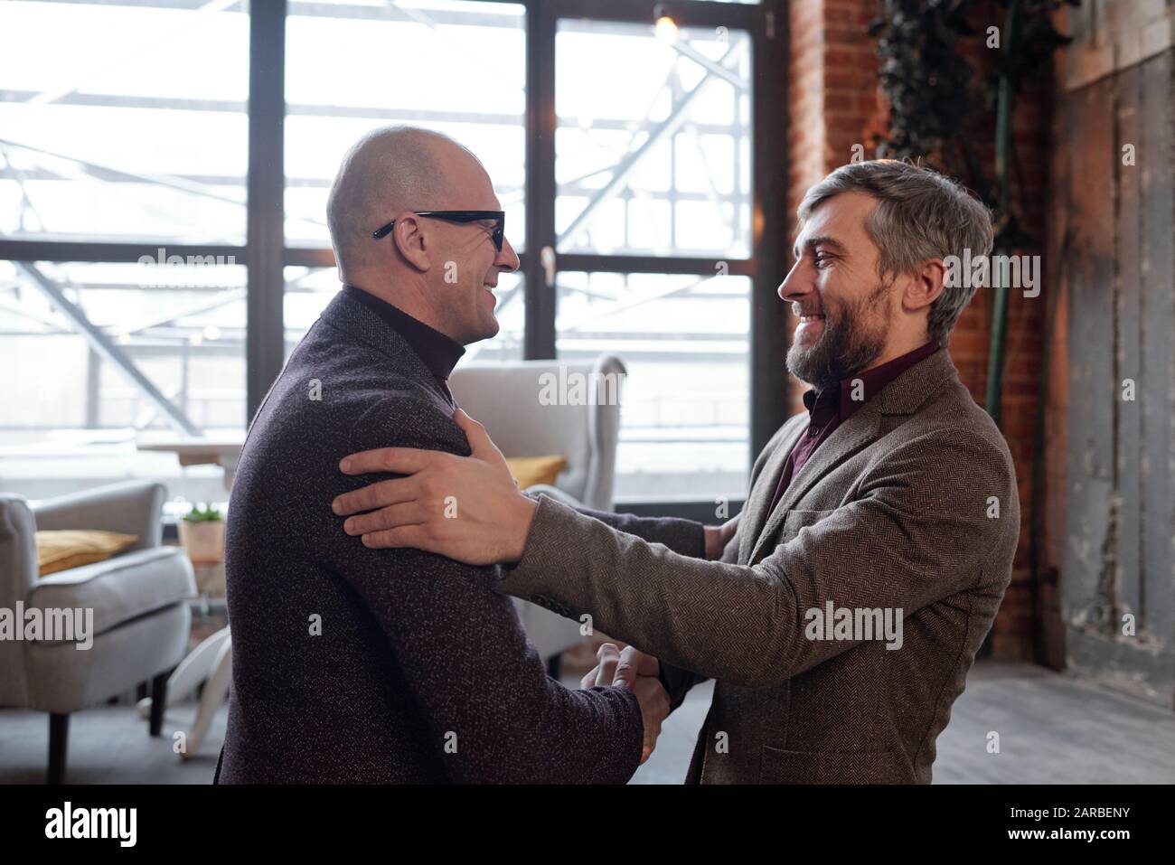 Congratulating men hi-res stock photography and images - Alamy