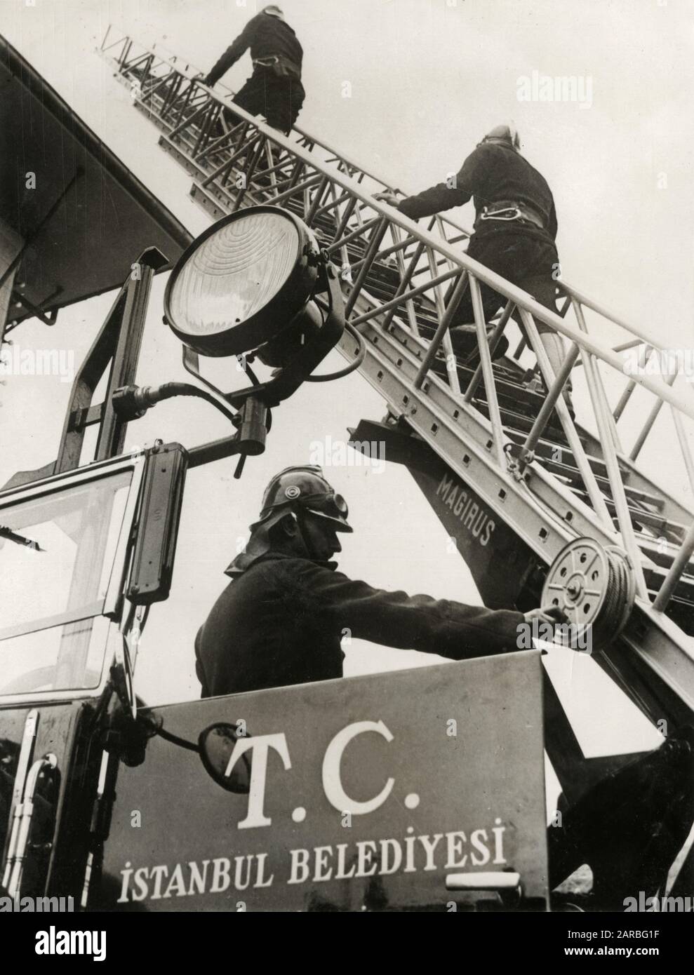 Firefighters climb ladder hi-res stock photography and images - Alamy