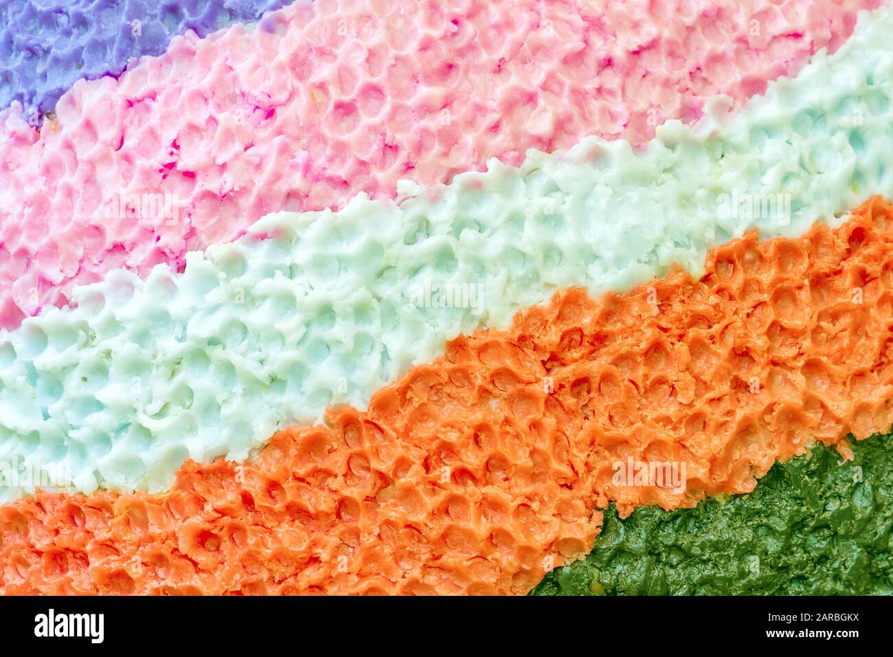 Close up to beautiful of various rough textures and colors of candles ...