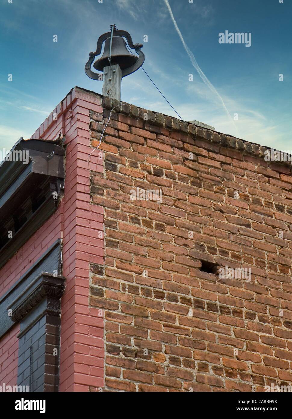 Bell on Old Brick Building Stock Photo - Alamy