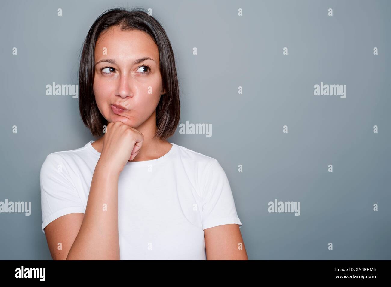 Suspicious woman portrait hi-res stock photography and images - Alamy