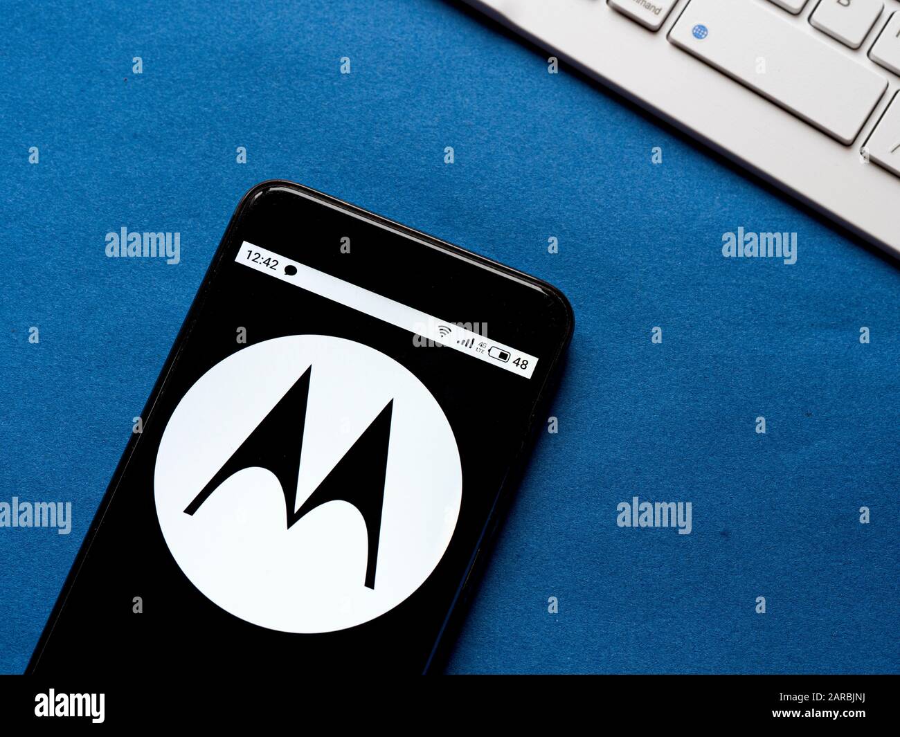 In this photo illustration a Motorola logo seen displayed on a ...
