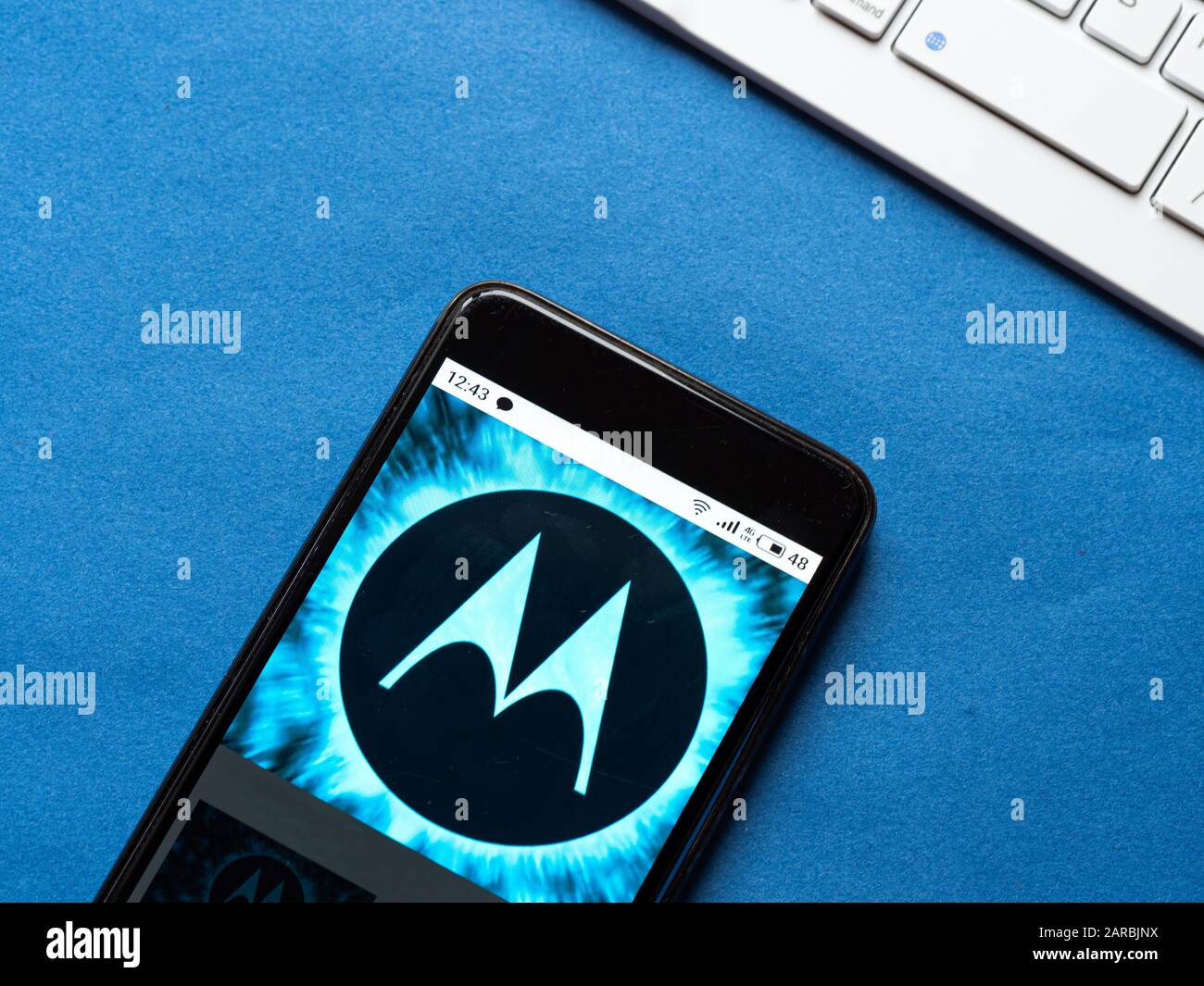In this photo illustration a Motorola logo seen displayed on a ...