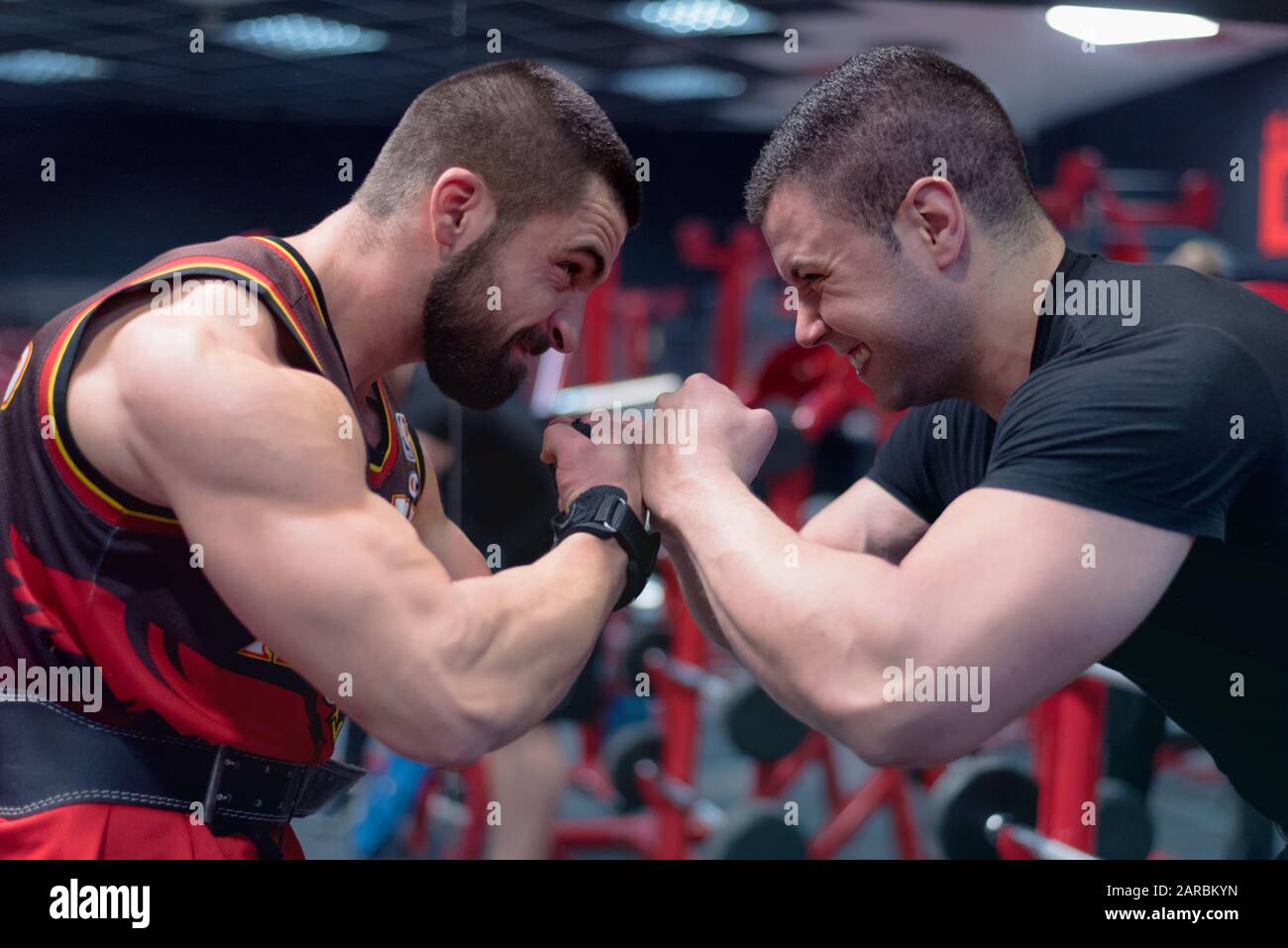 Two boxers looking at each other very close and trying to intimidate ...