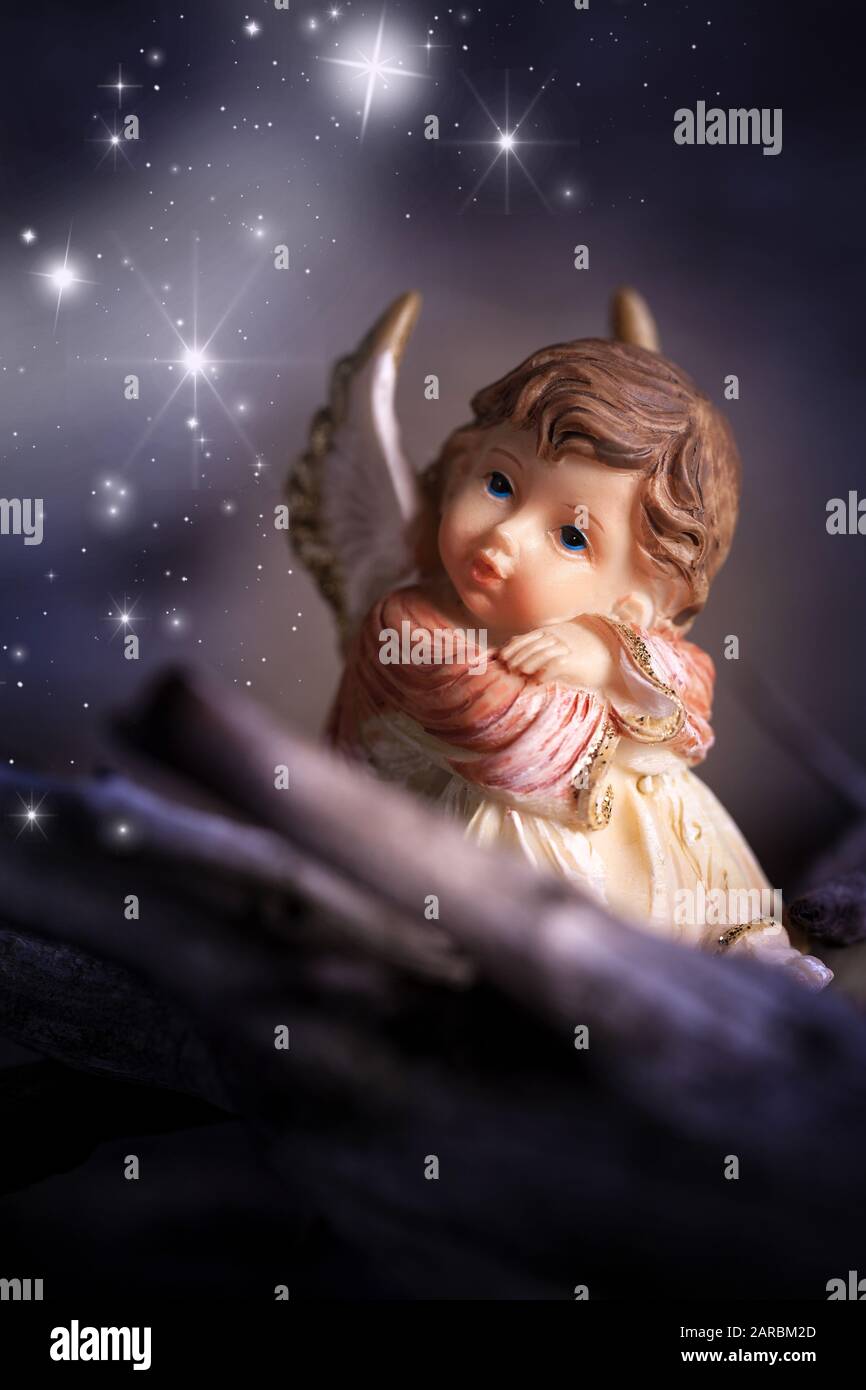 still life with angel and starry sky Stock Photo - Alamy