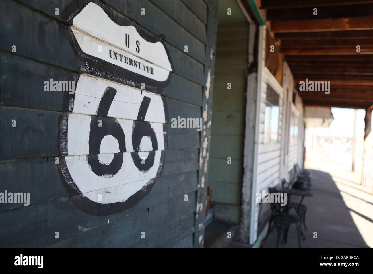 Painted Route 66 sign on wooden building, Route 66, America Stock Photo ...