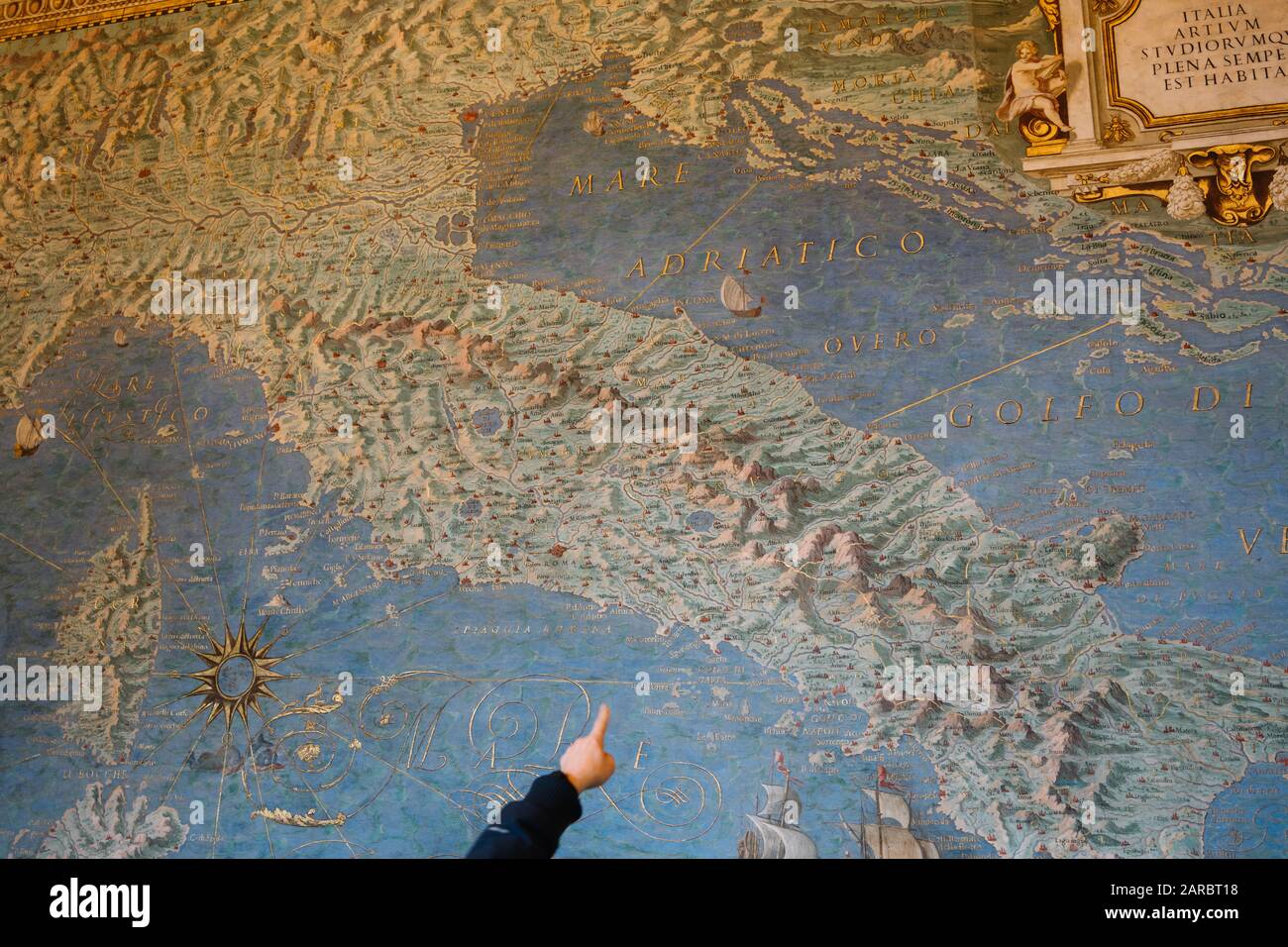 Rome, Italy - Jan 3, 2020: Wall and ceiling paintings in the Gallery of Maps with tourists ...