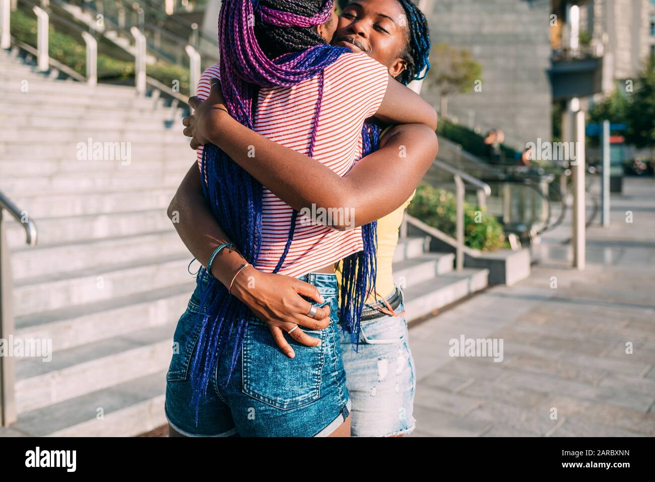 Two Sisters Outdoor Hugging Smiling Happiness Bonding Supporting