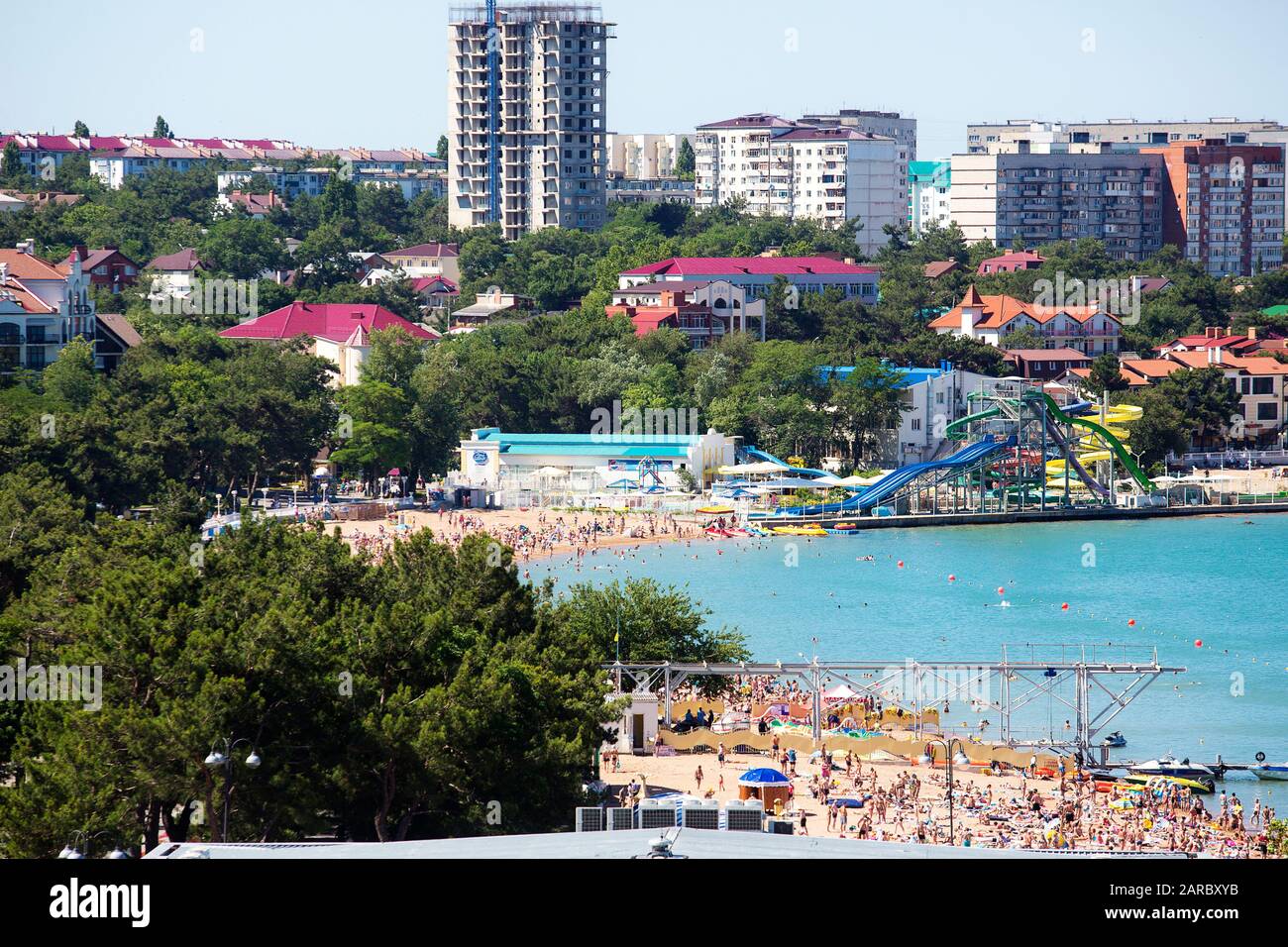 The Central beach of Gelendzhik resort with numerous sunbathers on the ...