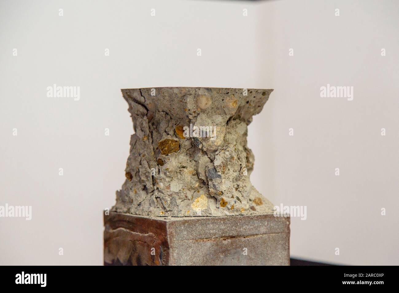 Construction laboratory. The press breaks down the cubic concrete ...