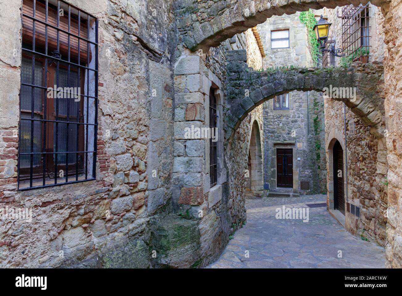 street of the ancient town in catalonia Stock Photo - Alamy