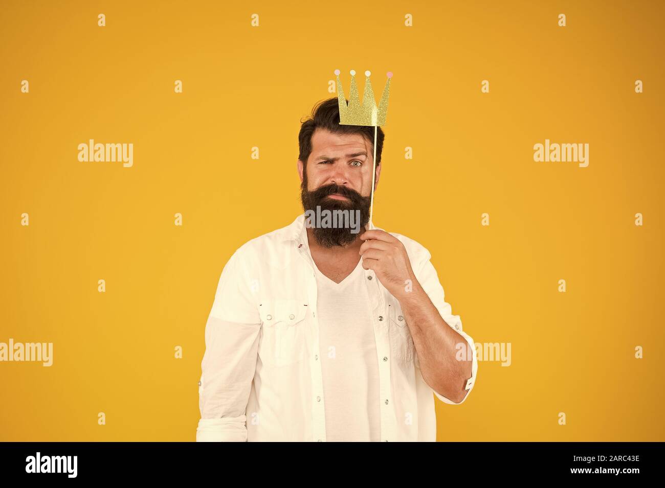 sad bearded man party crown. king of party. royal style. brutal bearded ...