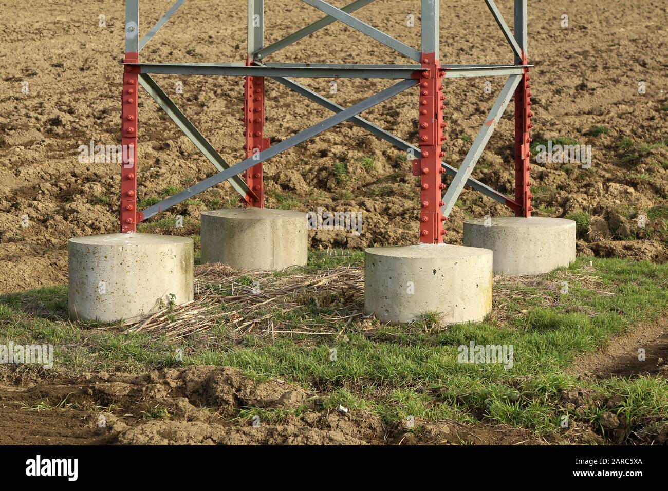 The foundation on which the high voltage mast stands Stock Photo - Alamy