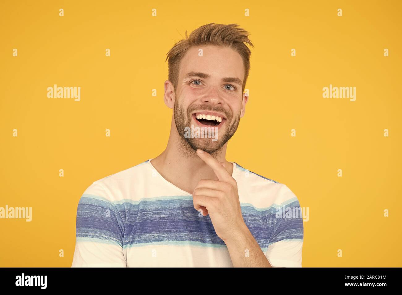 Happy emotional guy close up. Positive emotions. Happy man on yellow ...