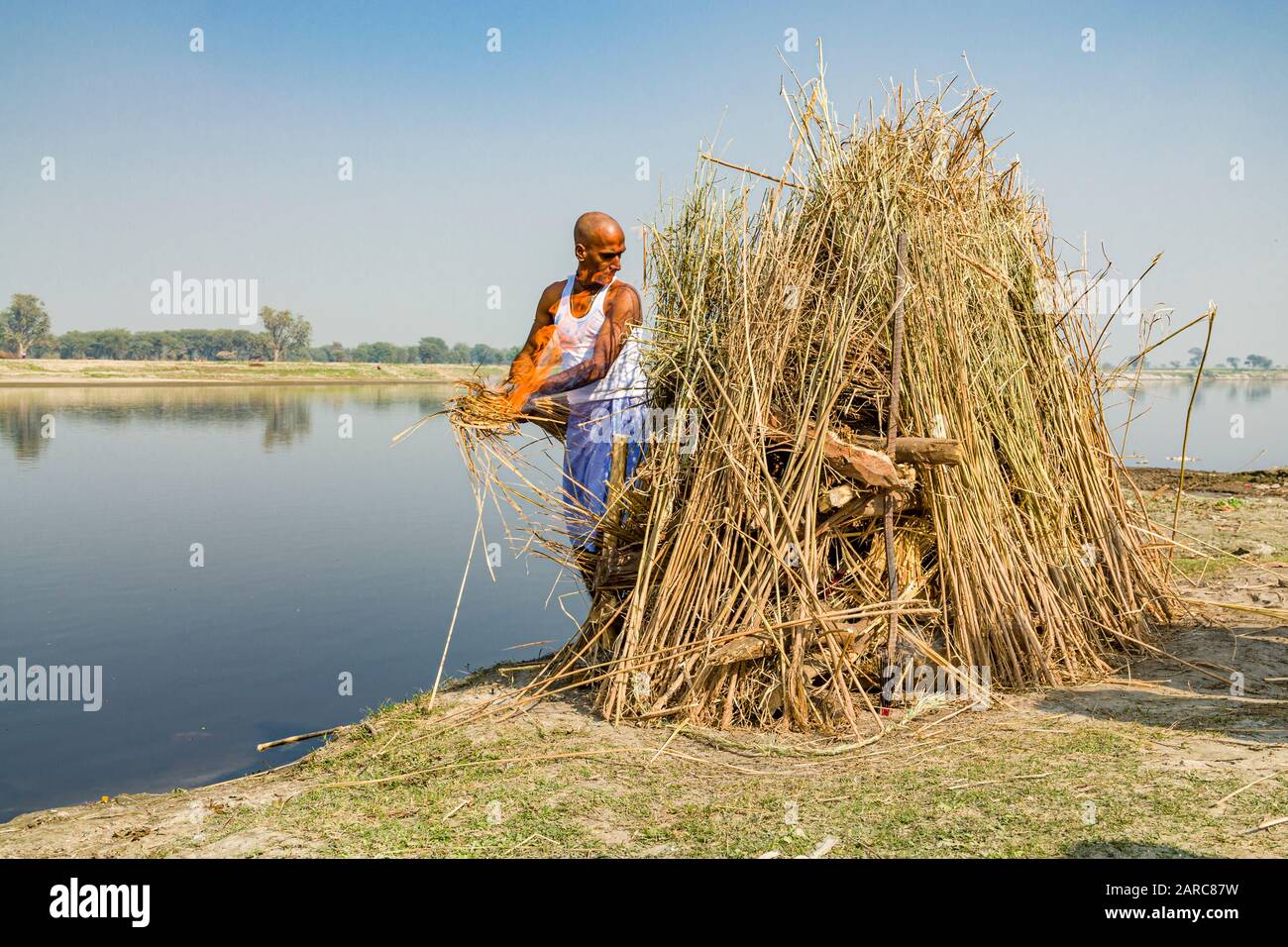 The eldest son lighting the fire as part of a cremation ceremony Stock ...