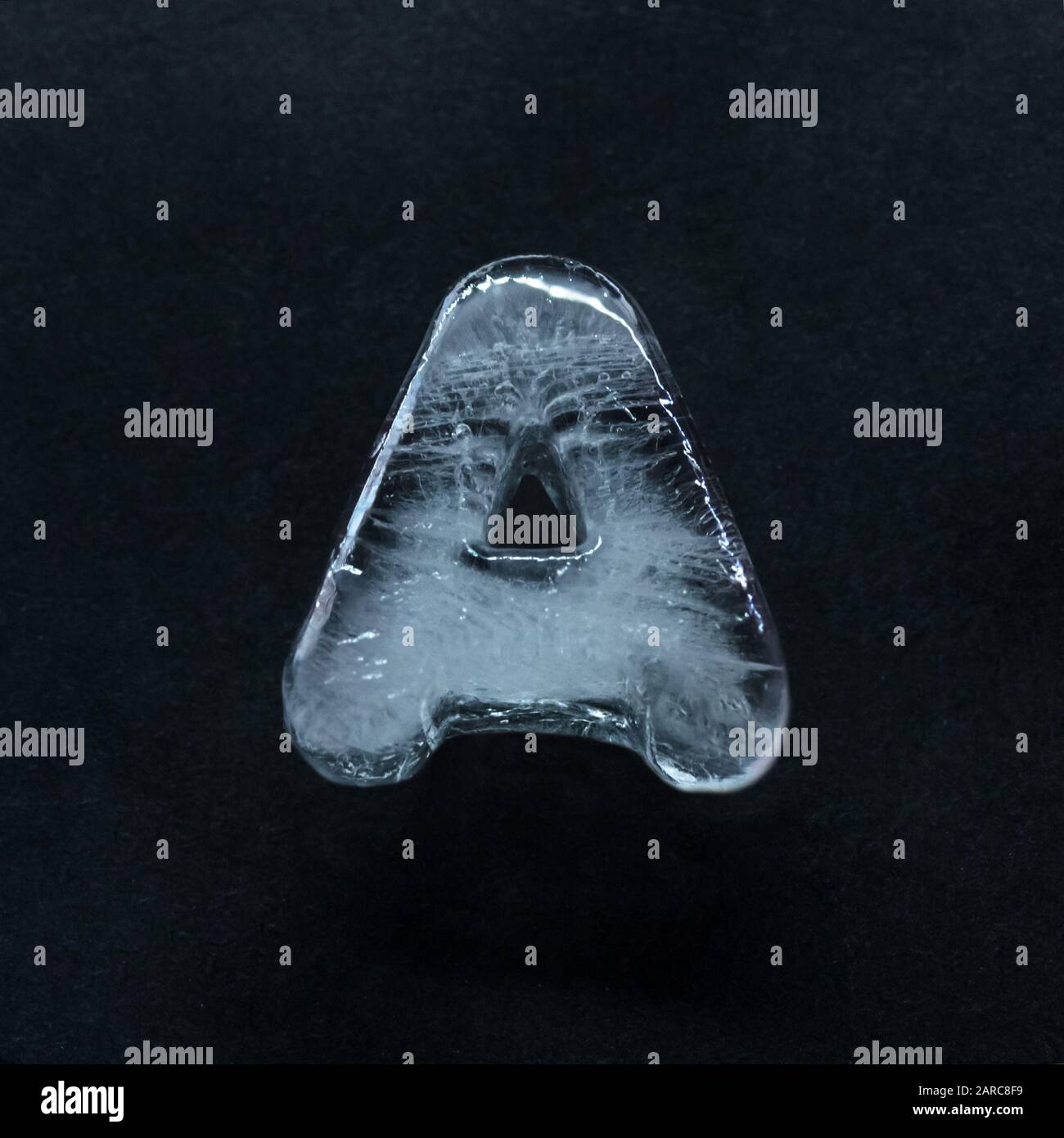 Melting speech. Alphabet's shiny and well-structured letters made out ...