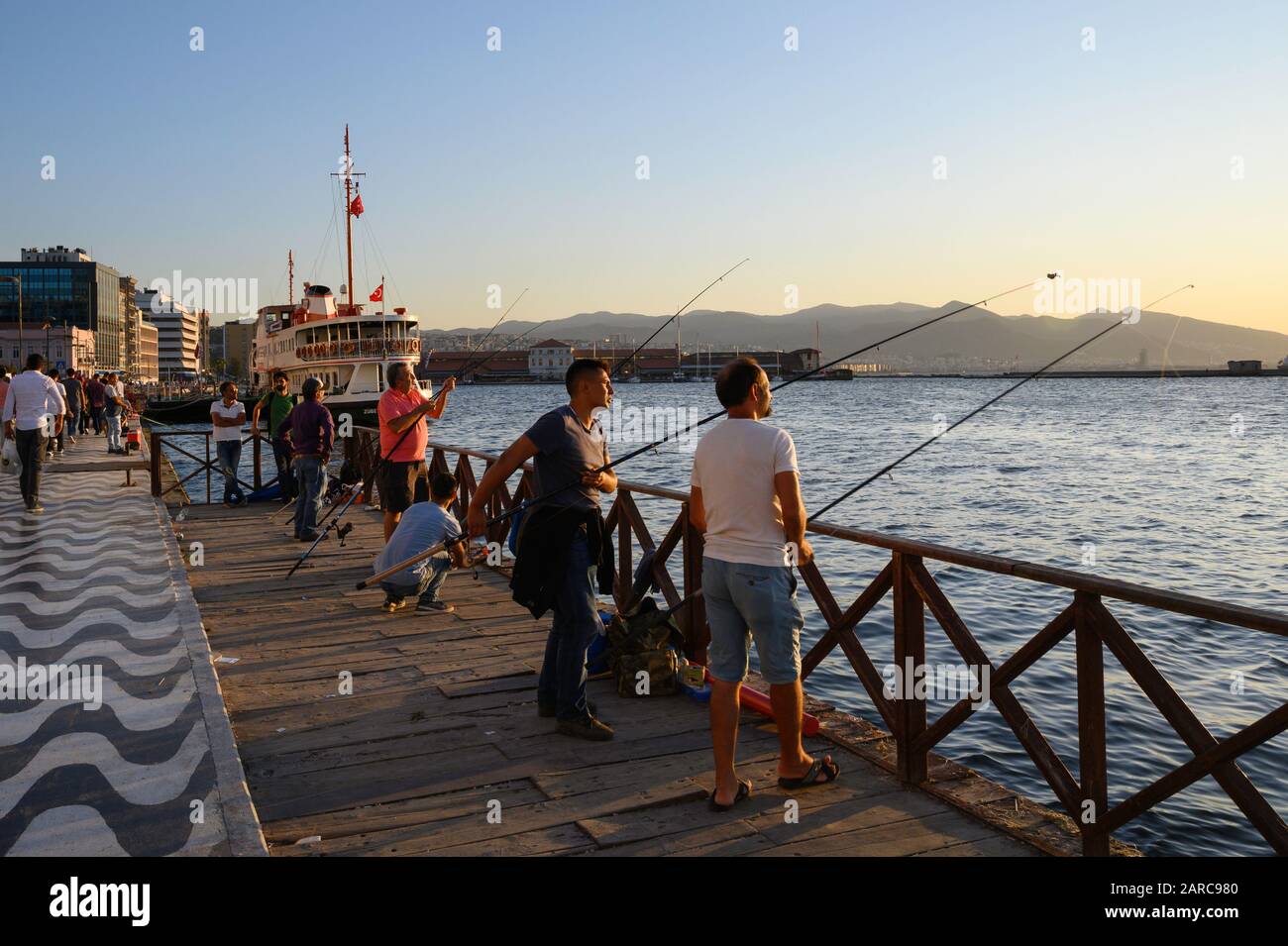 Fishing on the Kordon, the waterfront promenade in Izmir, Turkey on the ...