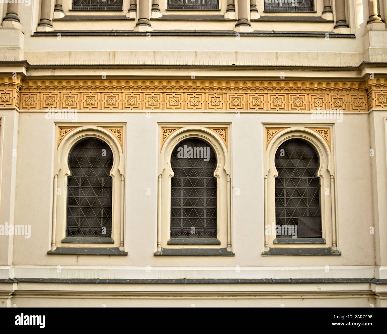 Three oriental windows of a Jewish synagogue with an islamic ...