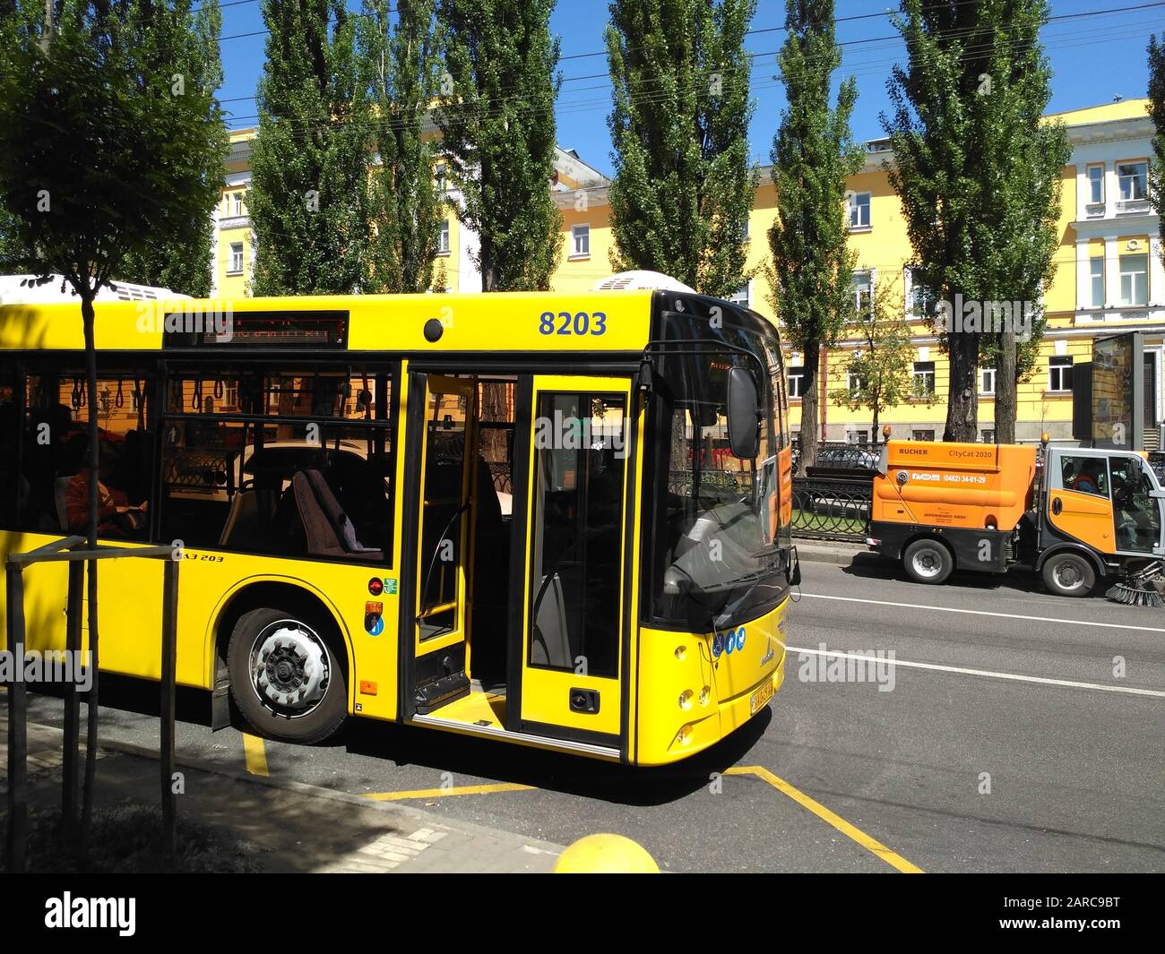 KIEV, UKRAINE - May 22, 2017: A public transportation yellow bus at a ...