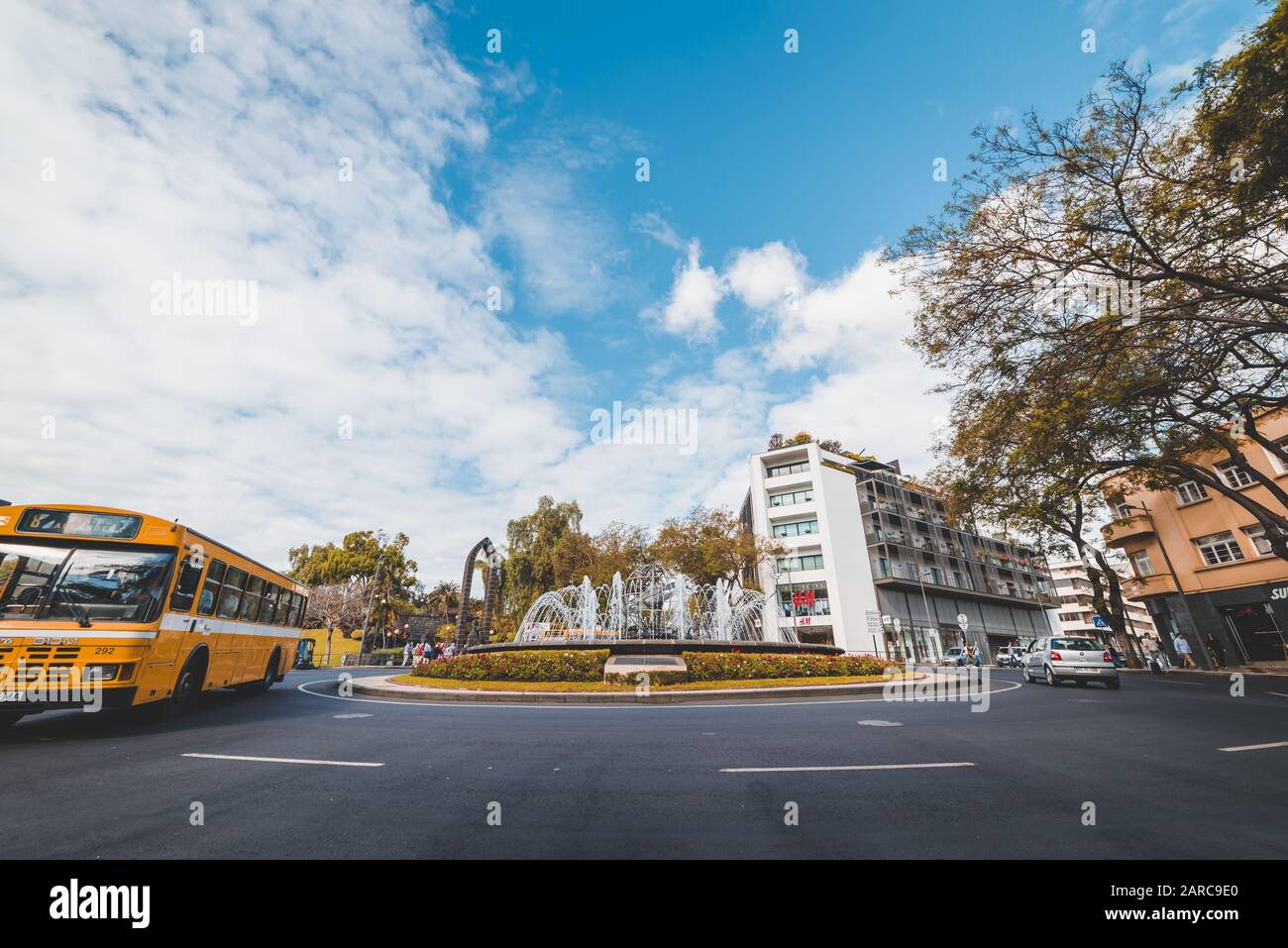 Low angle panoramic shot of a fountain at a city roundabout in Funchal ...