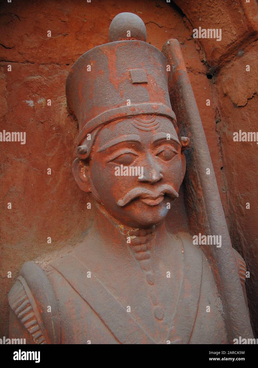 Vertical shot of a stone soldier statue Stock Photo - Alamy