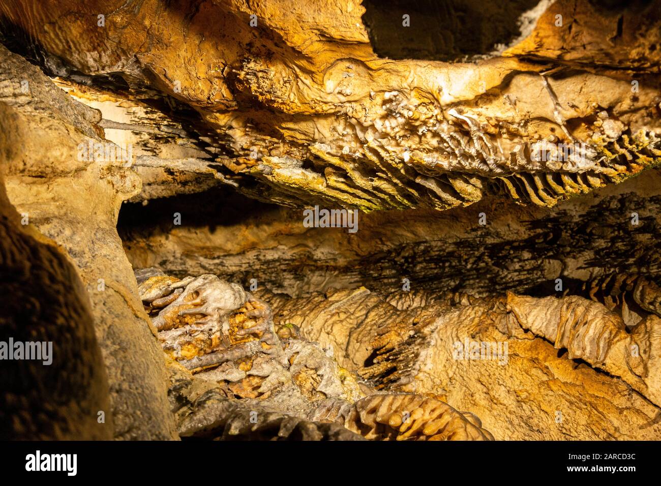 Abstract stone cave background. Rock formations on the arches and walls ...