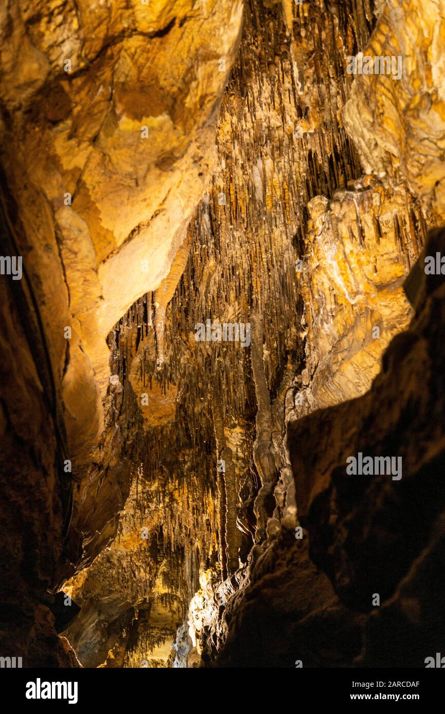 Abstract stone cave background. Rock formations on the arches and walls ...