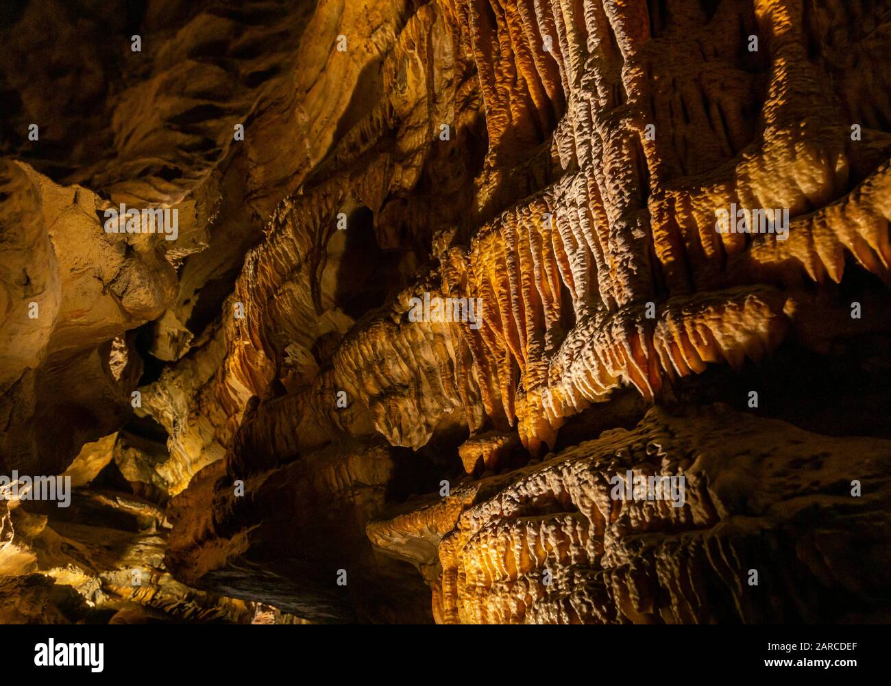 Abstract stone cave background. Rock formations on the arches and walls ...