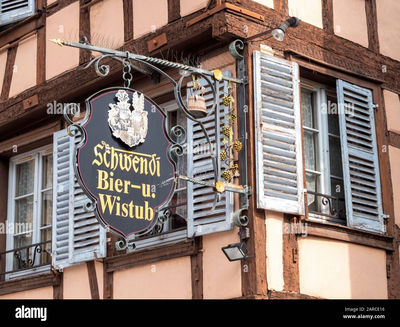 The traditional wrought iron sign at the Schwendi Bier u Winstub in ...