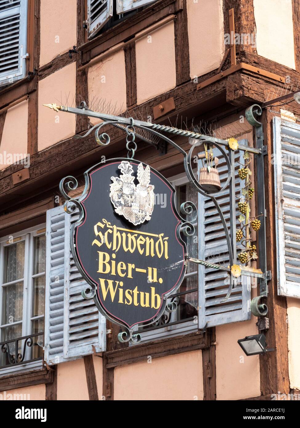 The traditional wrought iron sign at the Schwendi Bier u Winstub in ...
