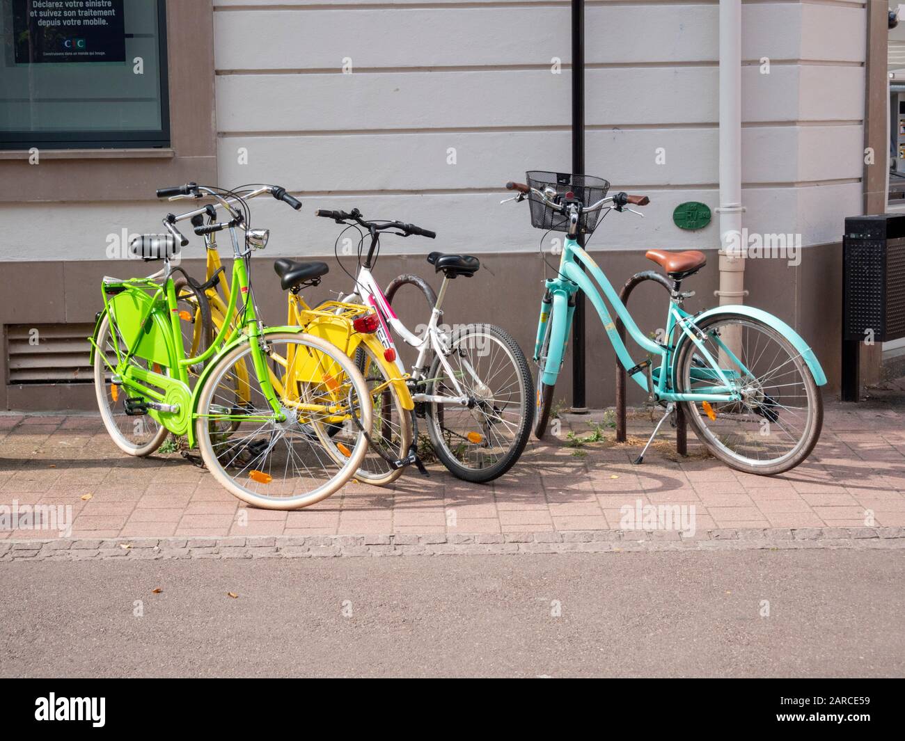 Colourful bicycles parked in a street in Colmar Alsace France Stock ...