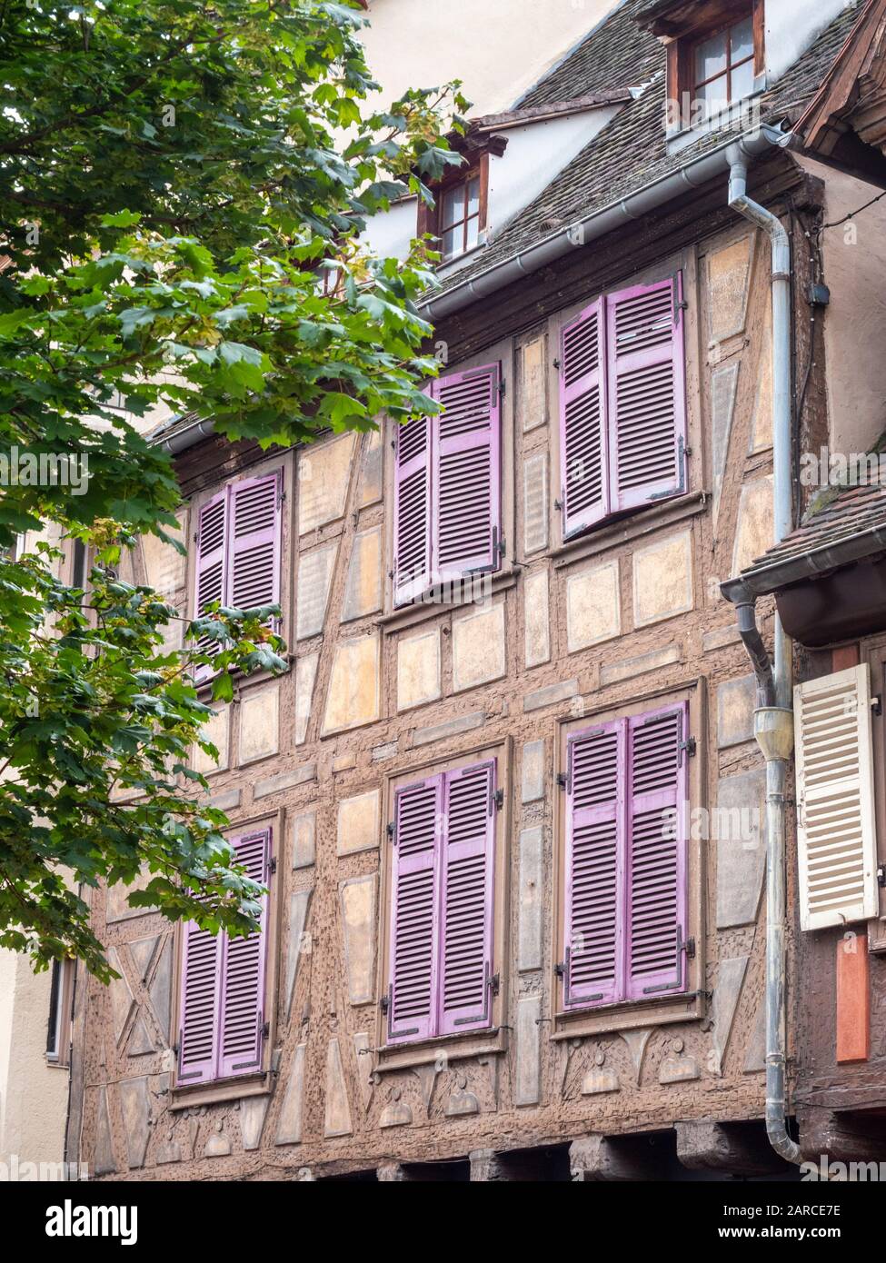 Pretty half timbered medieval houses and buildings in RiquewihrAlsace ...