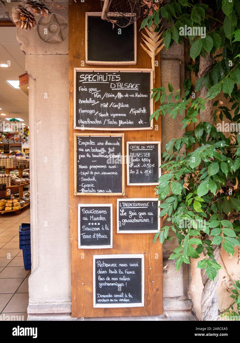 Menu boards outside a restaurant in Riquewihr Alsace France offering ...