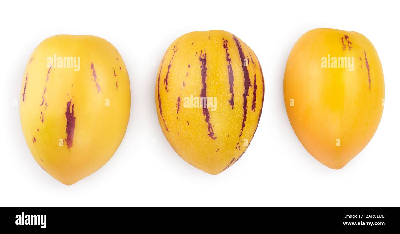 Fresh Pepino fruit with leaves isolated on white background. Top view ...