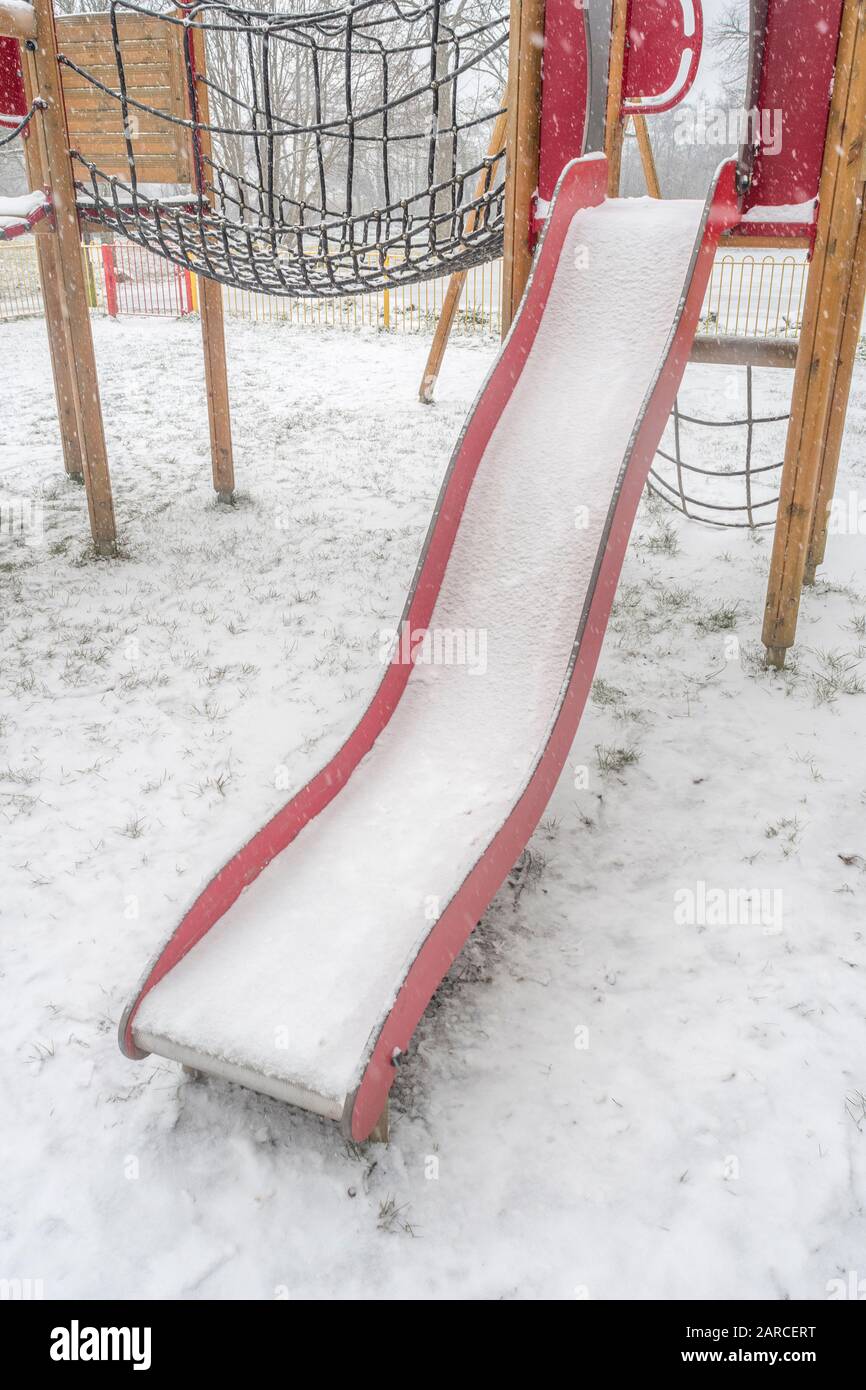 School playground swing slide hi-res stock photography and images - Alamy