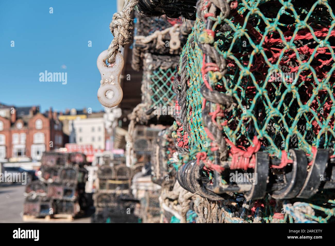 Nets, ropes and cages next to each other in a market Stock Photo - Alamy