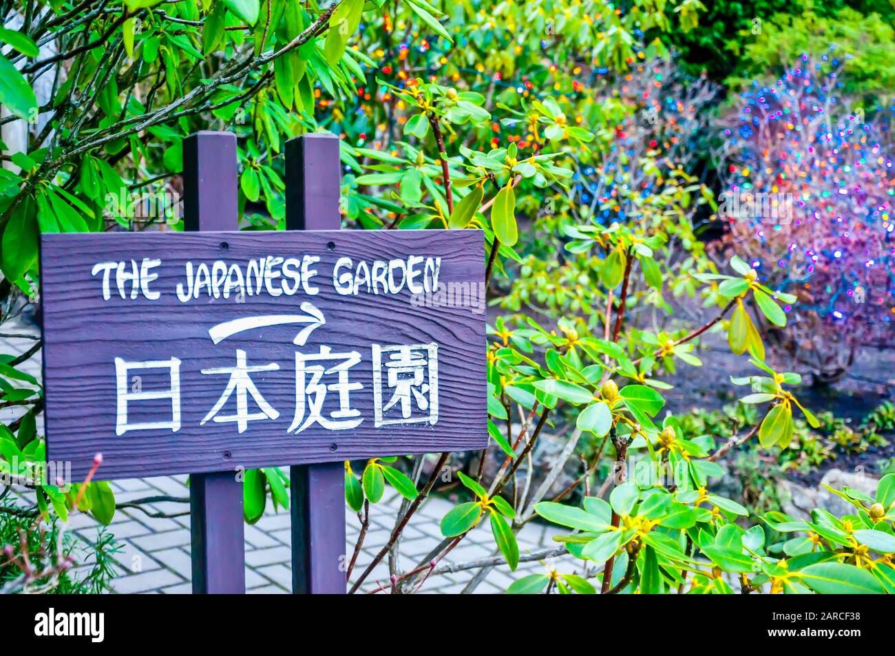 Sign saying Japanse Garden in front of trees and greenery Stock Photo ...