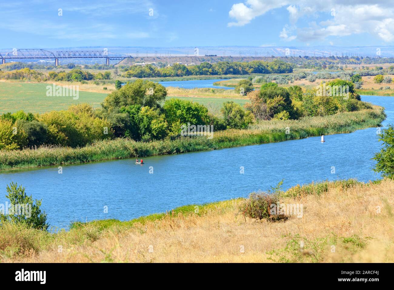 View of the Southern Bug River and the railway bridge on the horizon ...