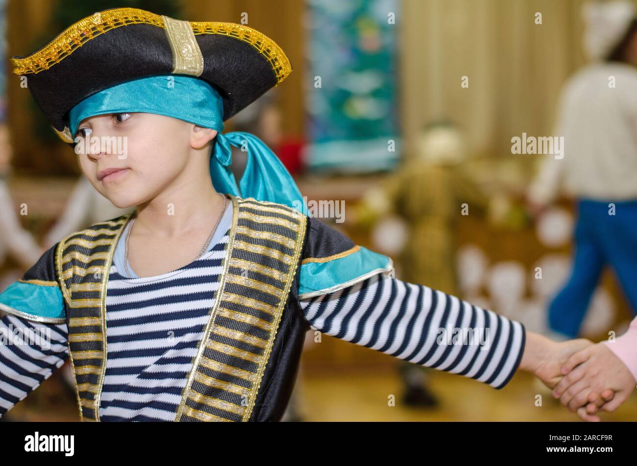 Children's Christmas New Year's concert. Children play with Snow Maiden ...