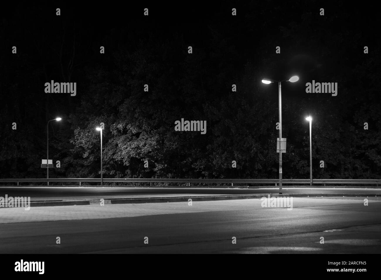 Wide angle shot of different street lights on the road at night Stock ...
