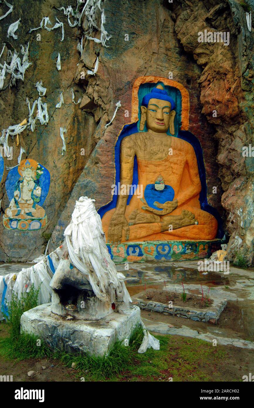 China, shrine with goddess bult into rock face in Tibet Stock Photo - Alamy